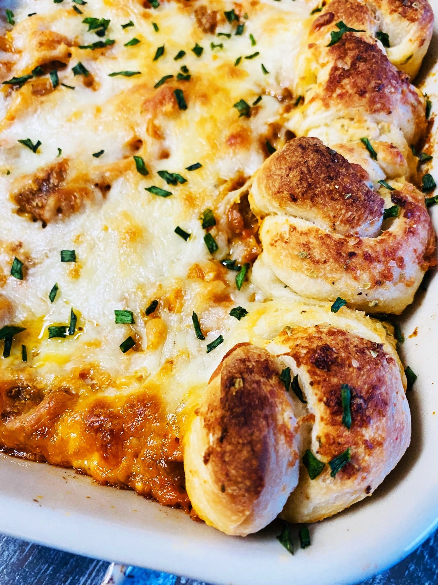 Cheesy Baked Spaghetti with Garlic Knots - Cooks Well With Others
