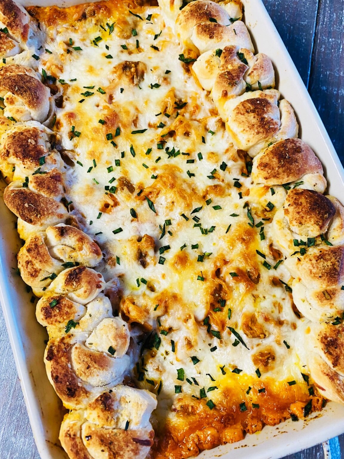 Cheesy Baked Spaghetti with Garlic Knots - Cooks Well With Others